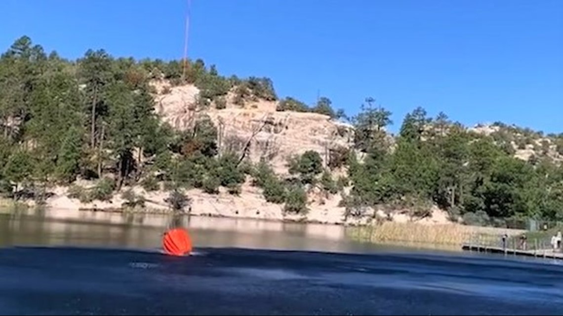Helicopter swoops in to grab water from lake | wfaa.com