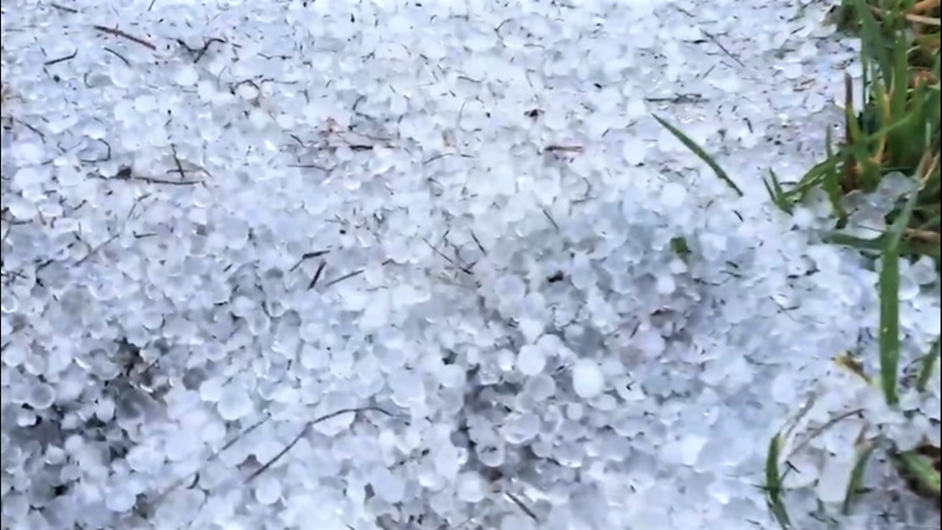 Hail lines the sides of the road | wfaa.com