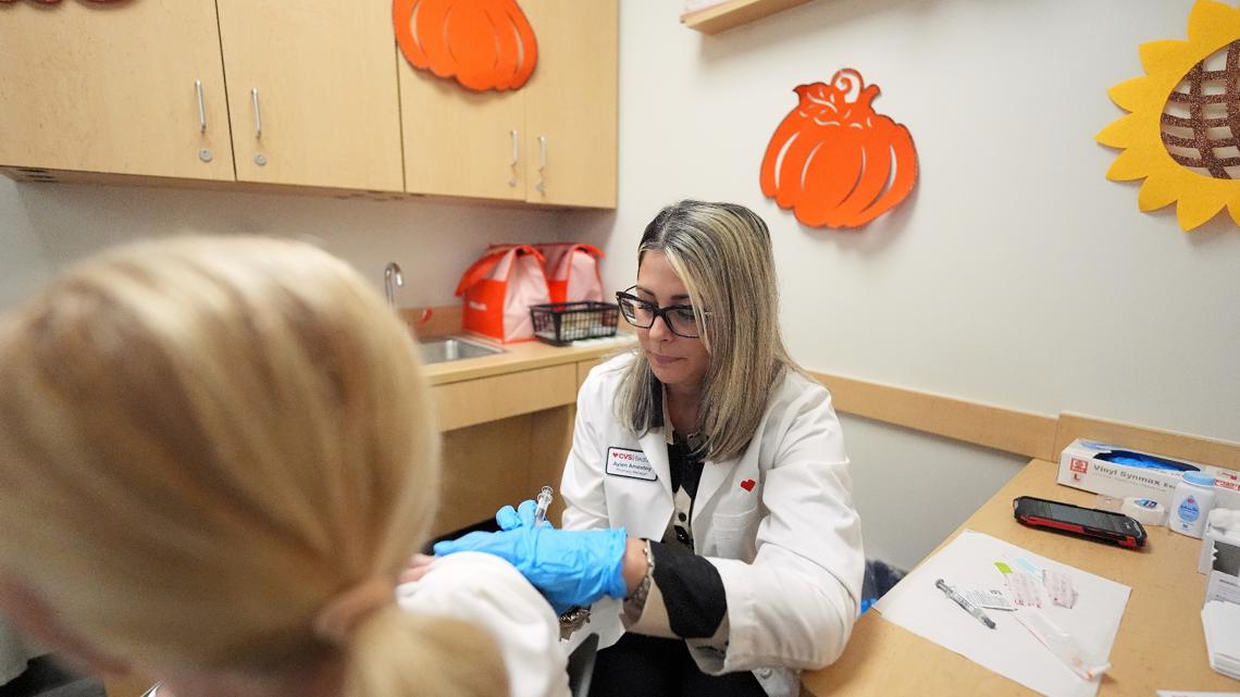 Insurers to cover updated COVID-19 vaccines this fall. What to know ...