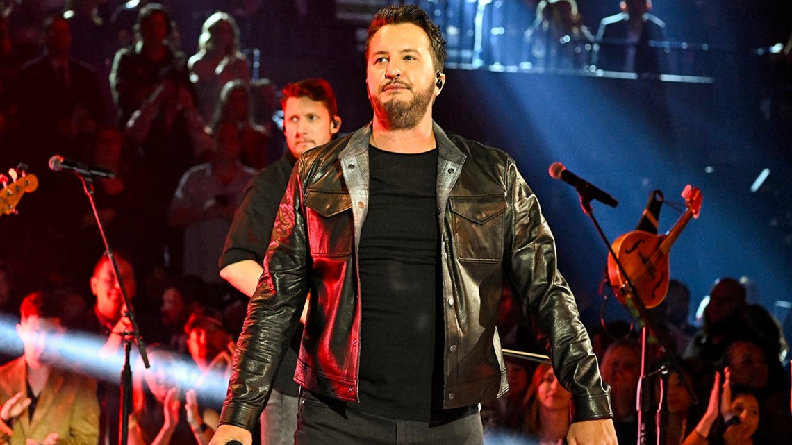 Luke Bryan Falls on Stage After Slipping on a Fan's Phone: 'My Lawyer ...