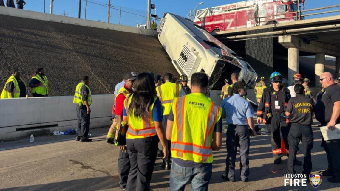 Houston METRO bus lifted off embankment after falling from elevated ...