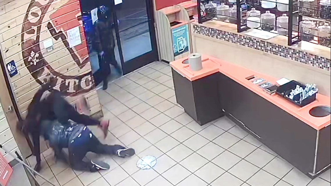 Video captures suspects slipping, falling during armed robbery | wfaa.com