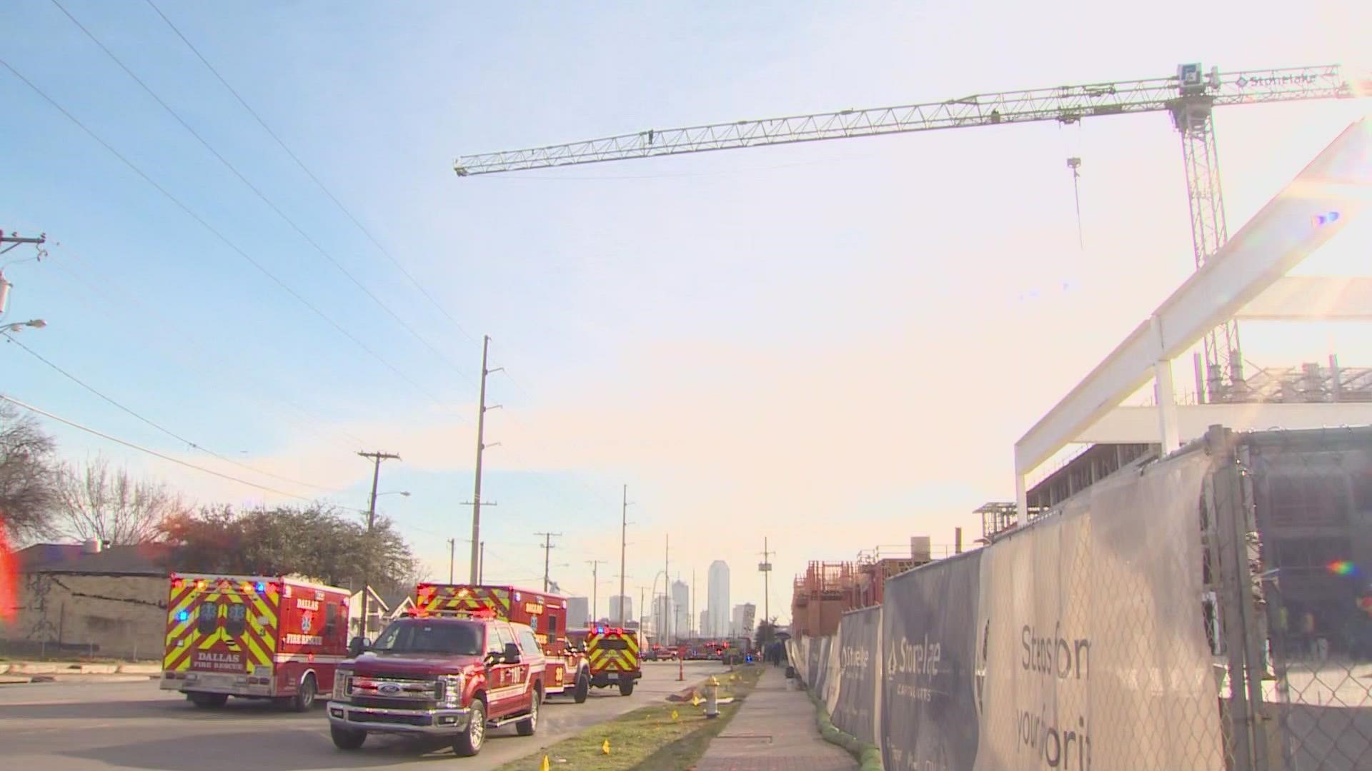 Police shut down Dallas street as crews respond to man on crane | wfaa.com