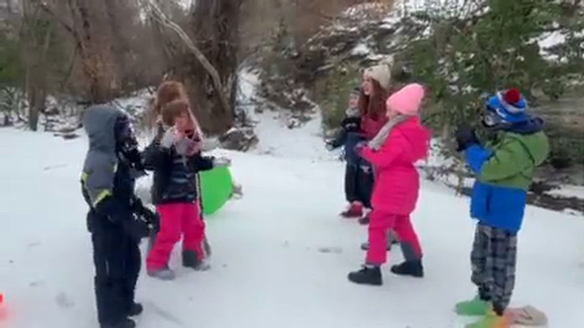 Snowball fight after the Jan 2026 winter storm | wfaa.com