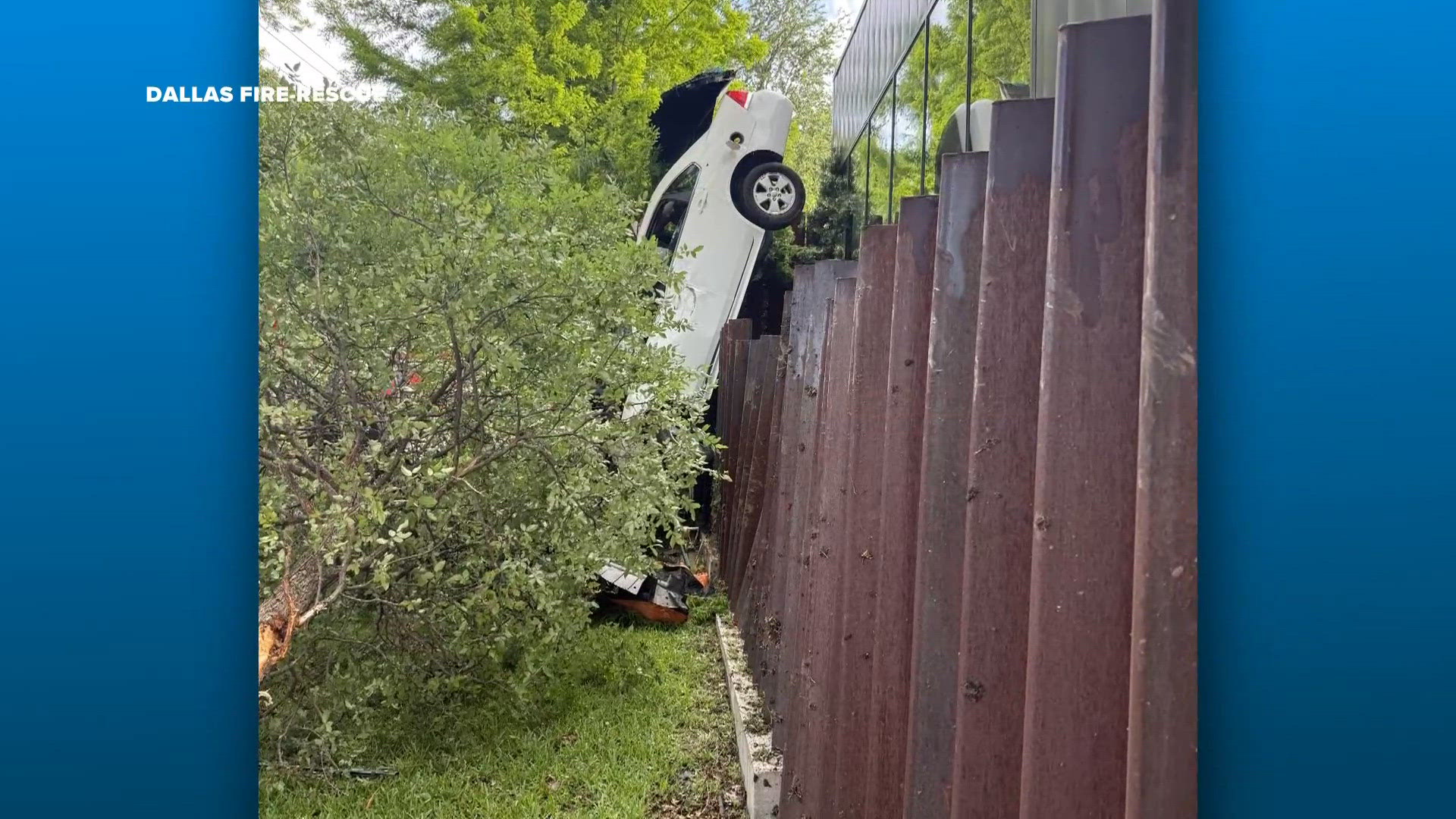 Dallas firefighters rescue driver after car crashes vertically between ...