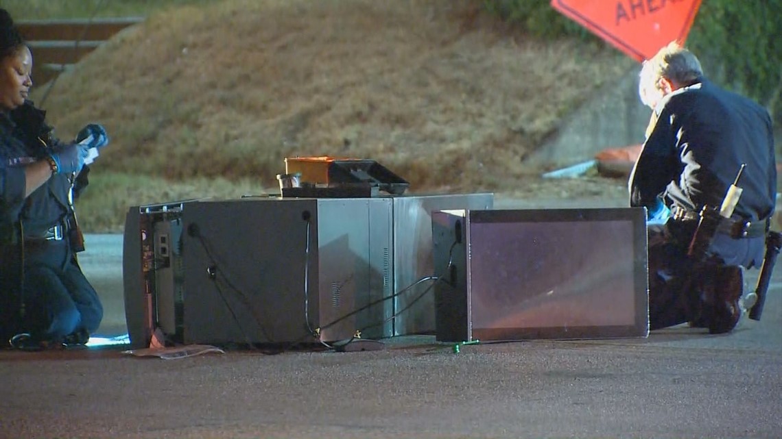 ATM falls out of truck as masked men attempt to steal it, police say ...