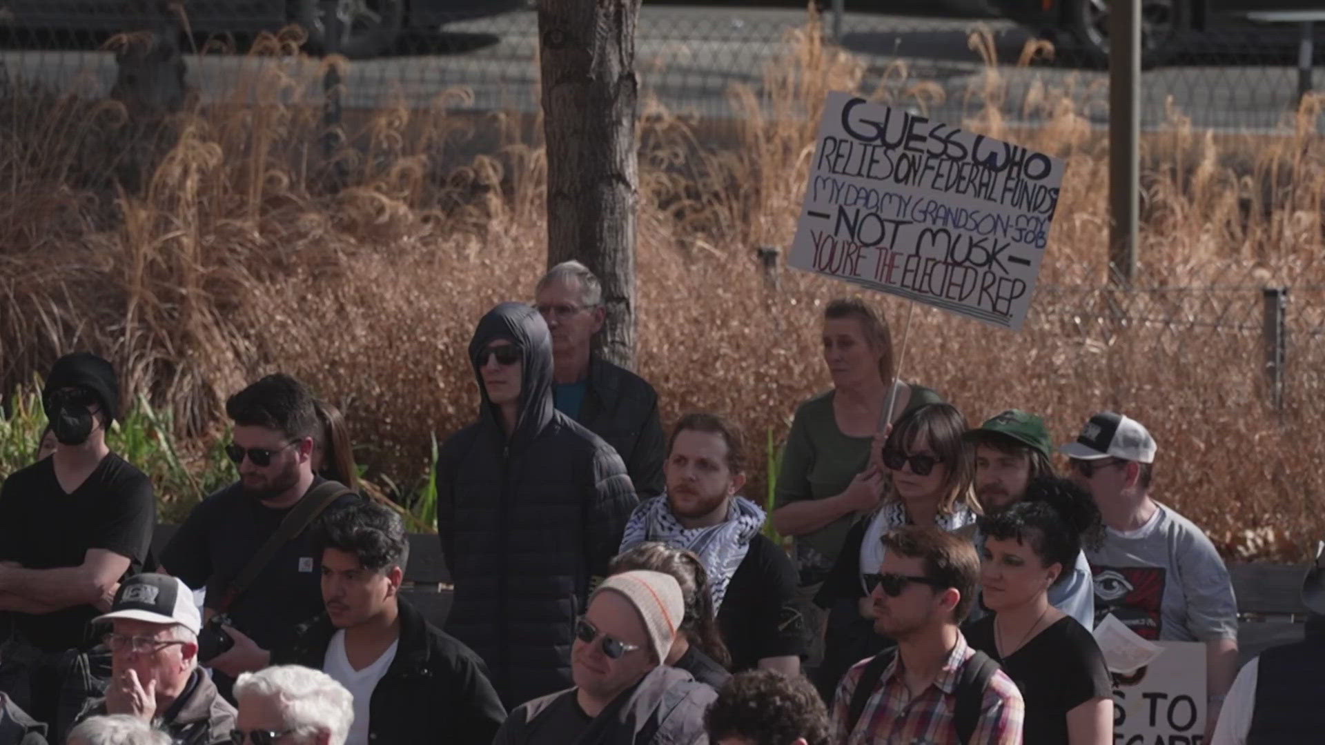 Protesters gather in downtown Dallas to voice frustrations over cuts to ...