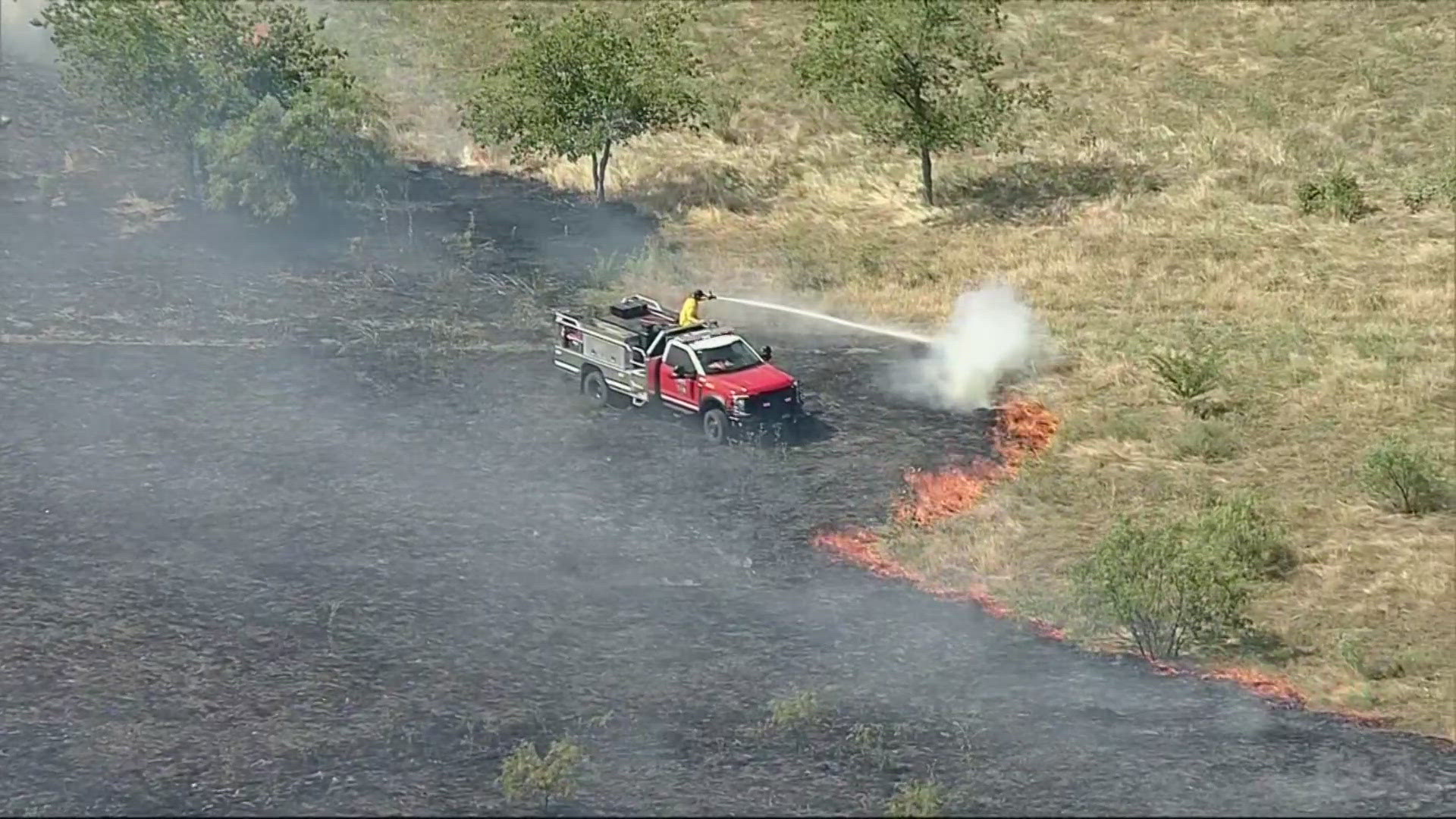 Flower Mound Fire Department working to douse large grass fire | wfaa.com