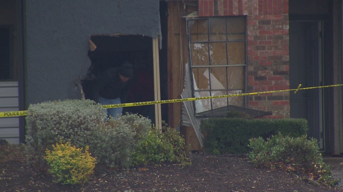 Police: Woman killed after driver crashes into apartment building ...