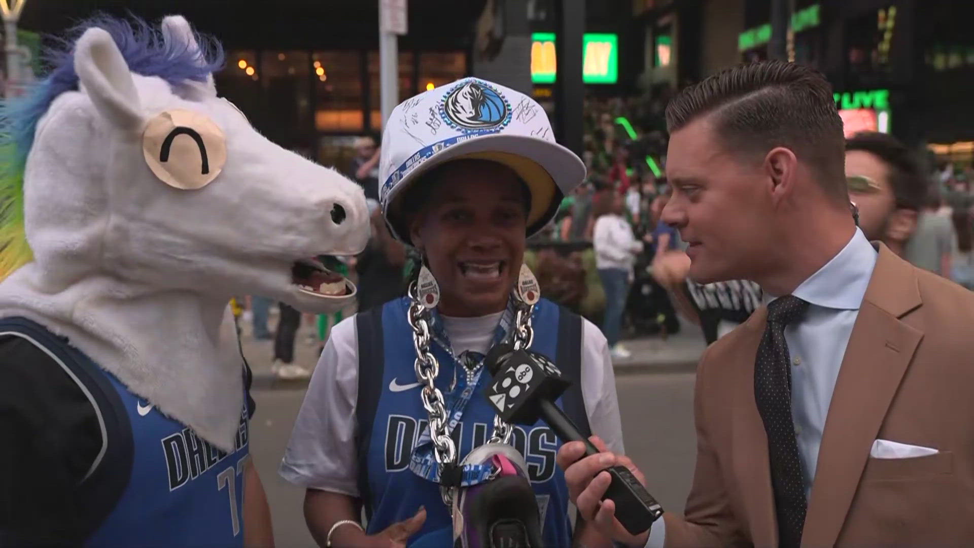 WFAA's Mike Leslie speaks to fans outside the TD Garden ahead of Game 1 ...