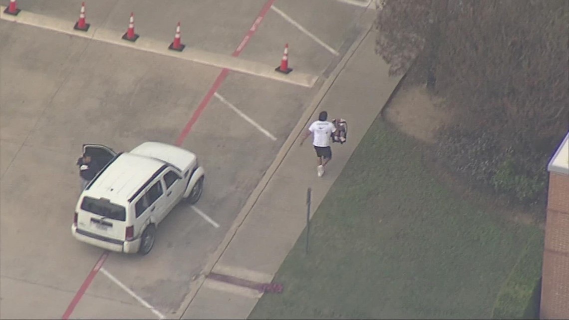 Dallas chase: Suspects arrested, baby rescued at health center | wfaa.com