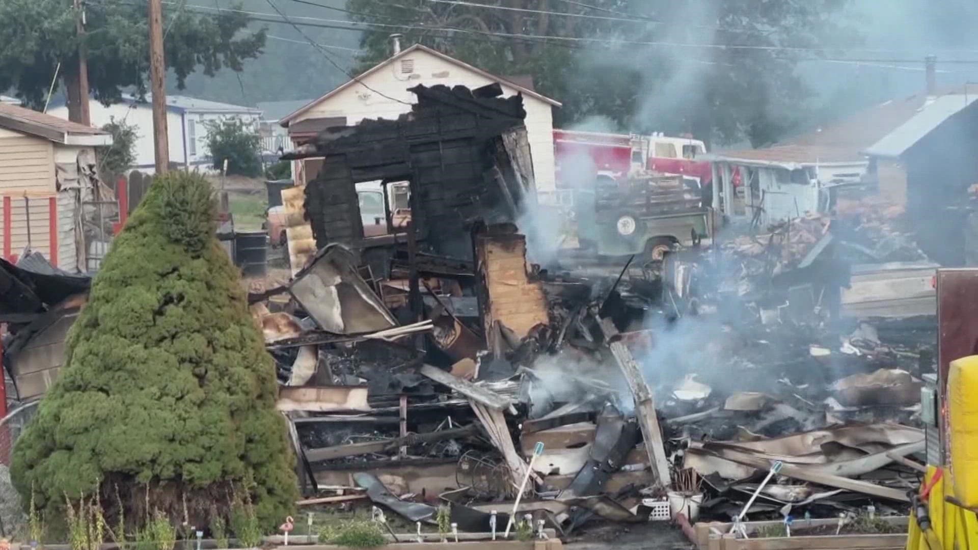 California wildfire kills 2; severe flooding turns deadly in the south ...