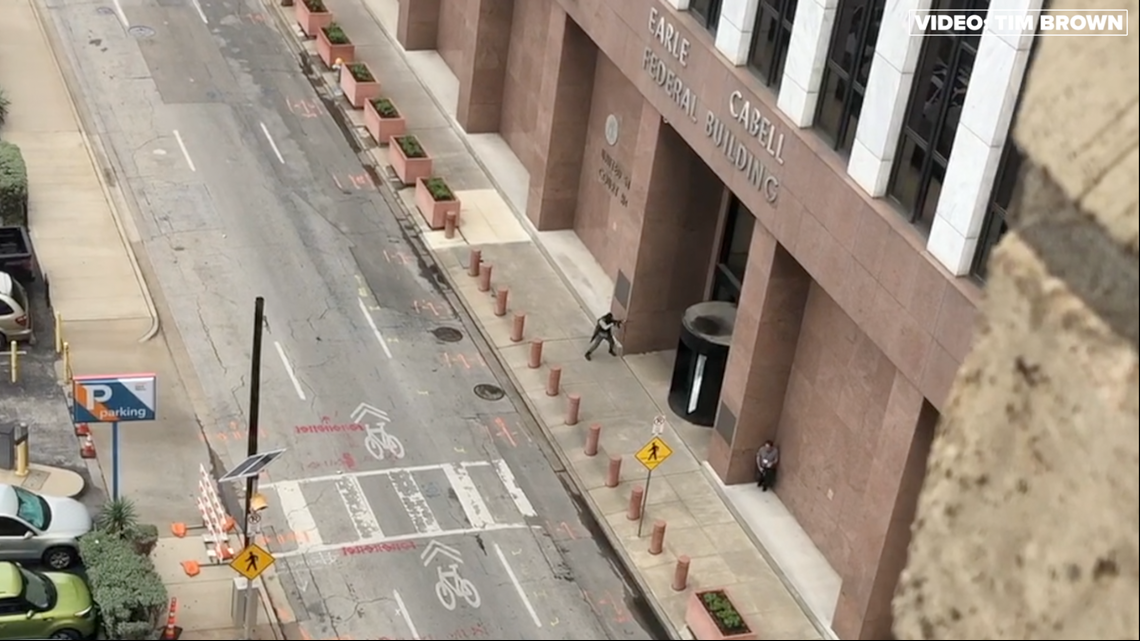 WATCH: Video captures shooting between gunman, officers outside federal ...