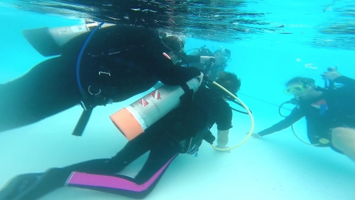 Adaptive program helps people with disabilities learn to scuba dive ...