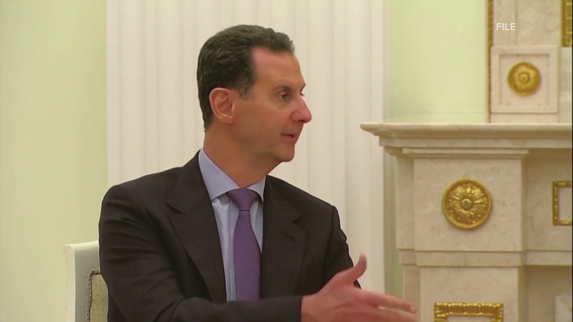 Rebel fighters oust Assad family from Syrian government | wfaa.com