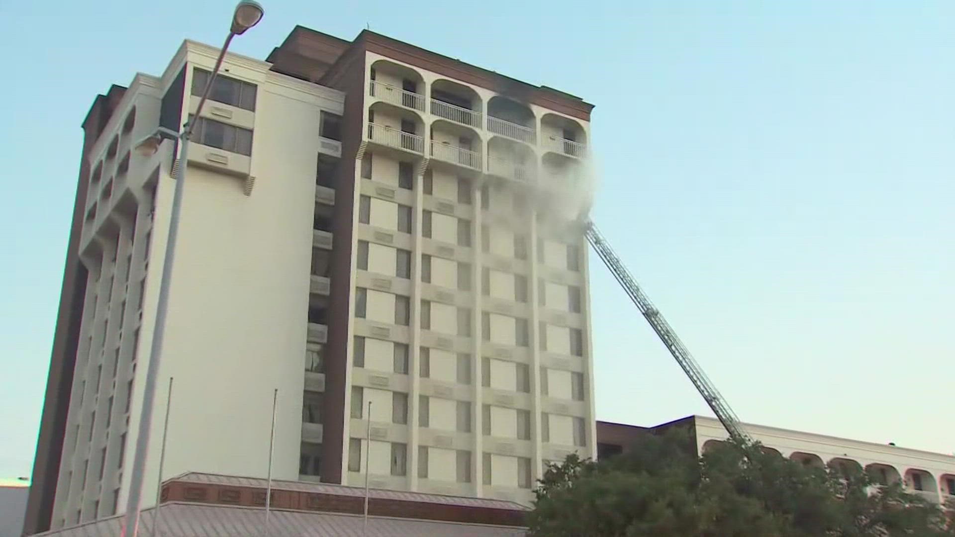 Abandoned high-rise catches fire in northwest Dallas | wfaa.com