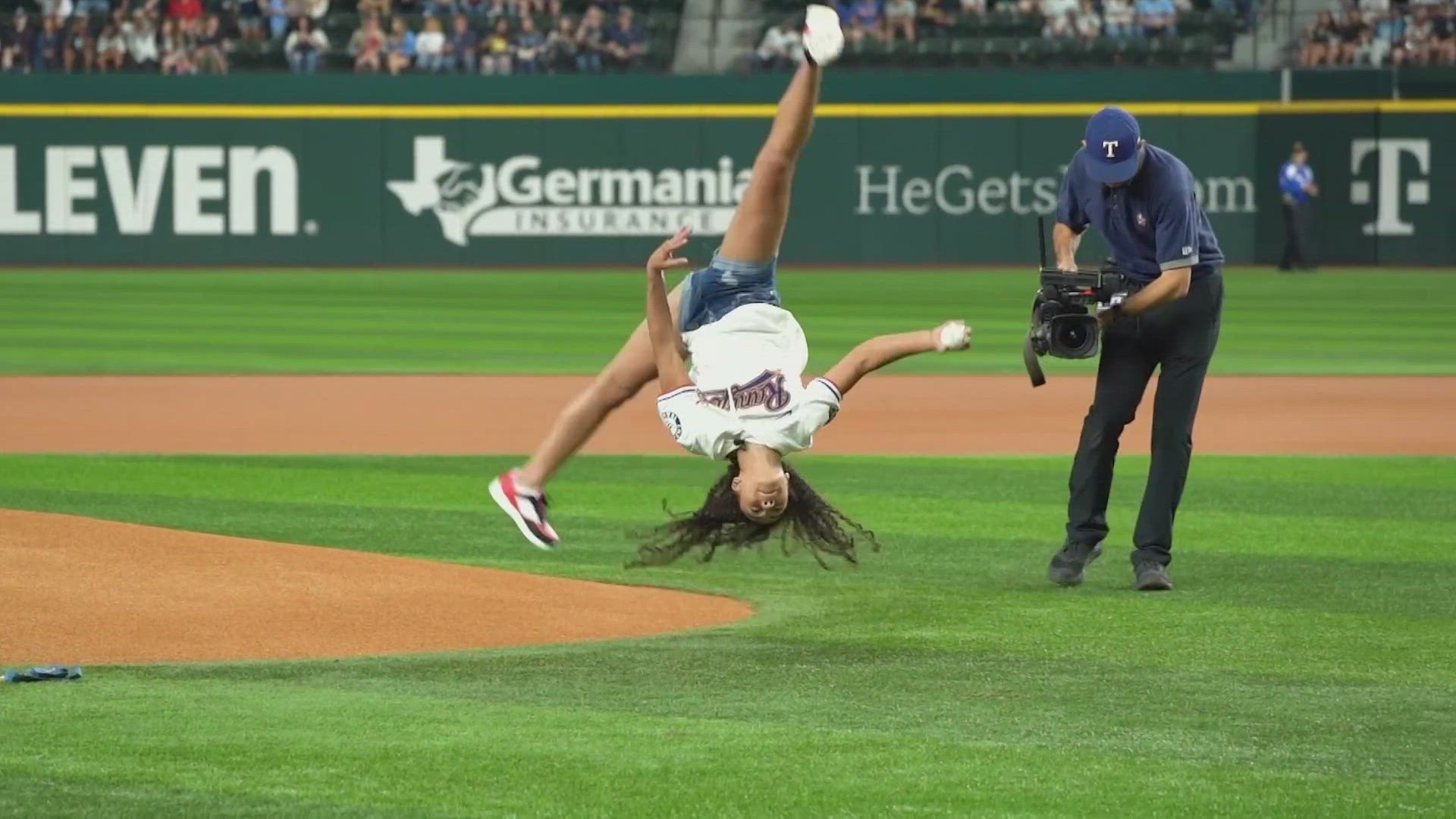 Olympian Hezly Rivera throws the first pitch at Texas Rangers game ...