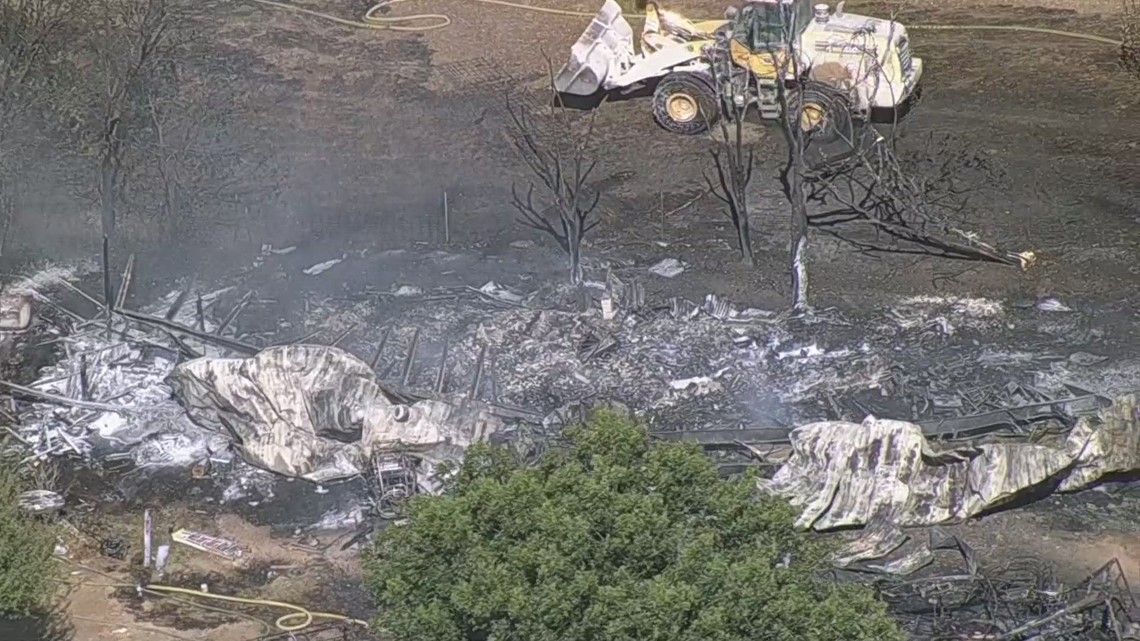 Firefighters dousing hot spots of fire at mobile home community in ...