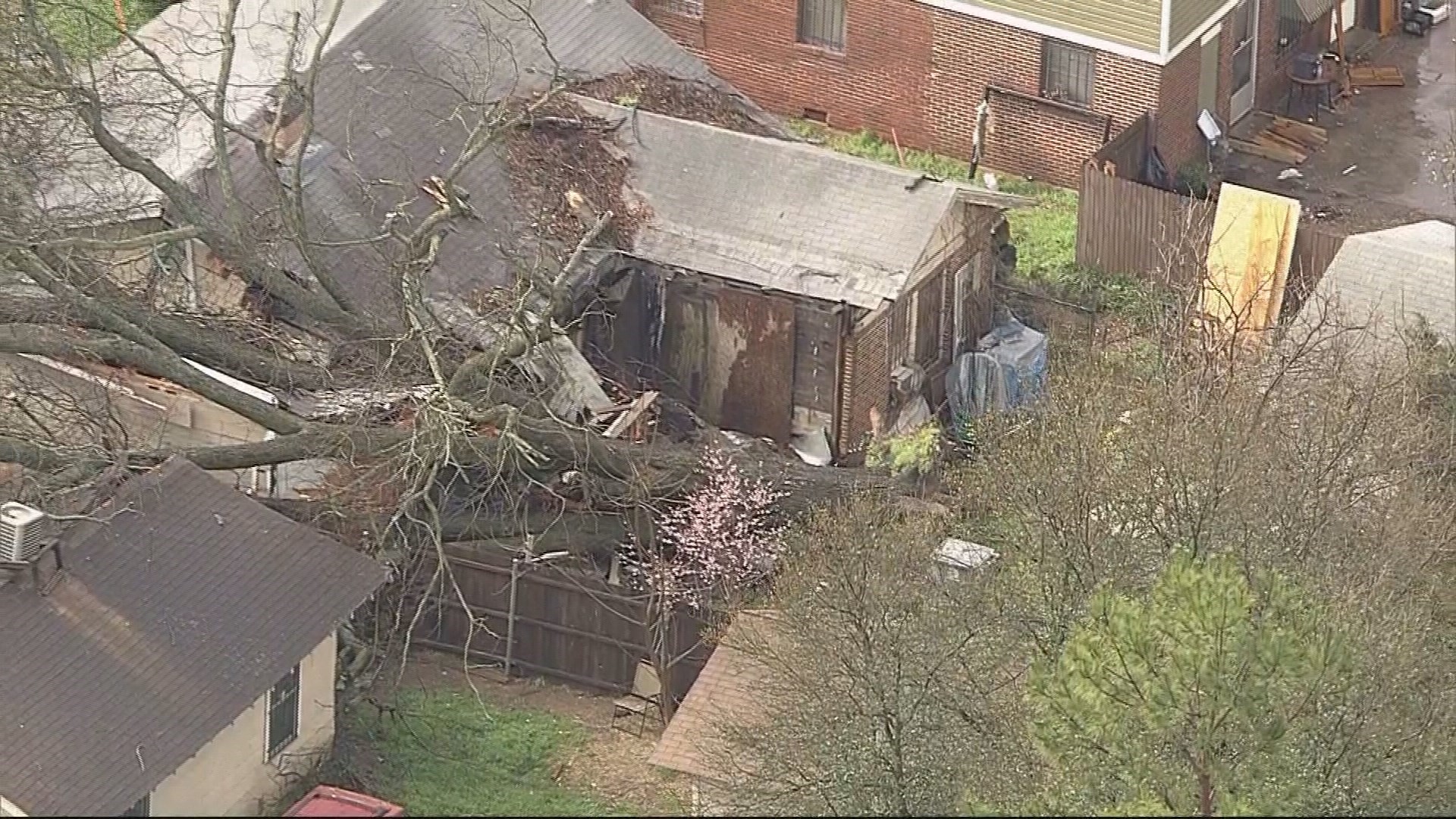 PHOTOS: Strong winds and severe storms damage buildings, houses in ...