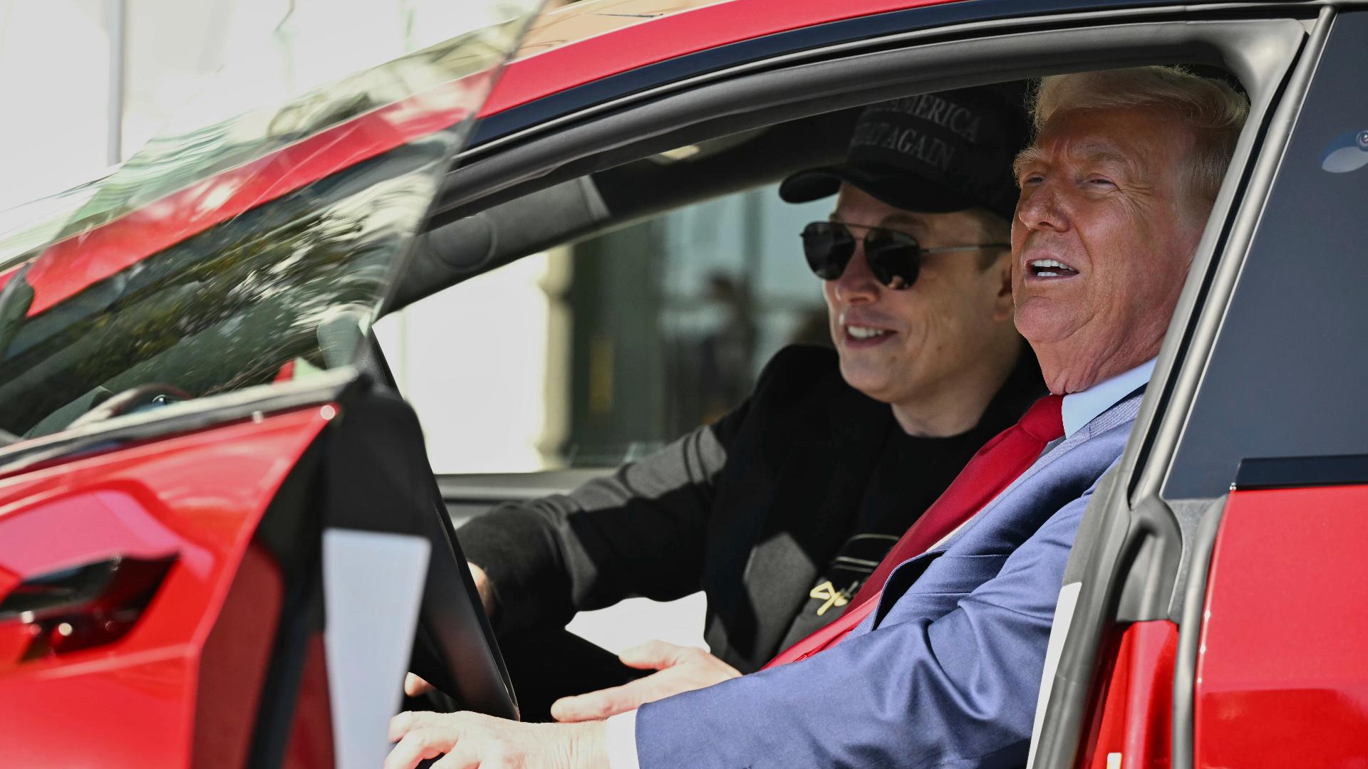 Donald Trump gets in driver's seat in Tesla in show of support for Elon ...