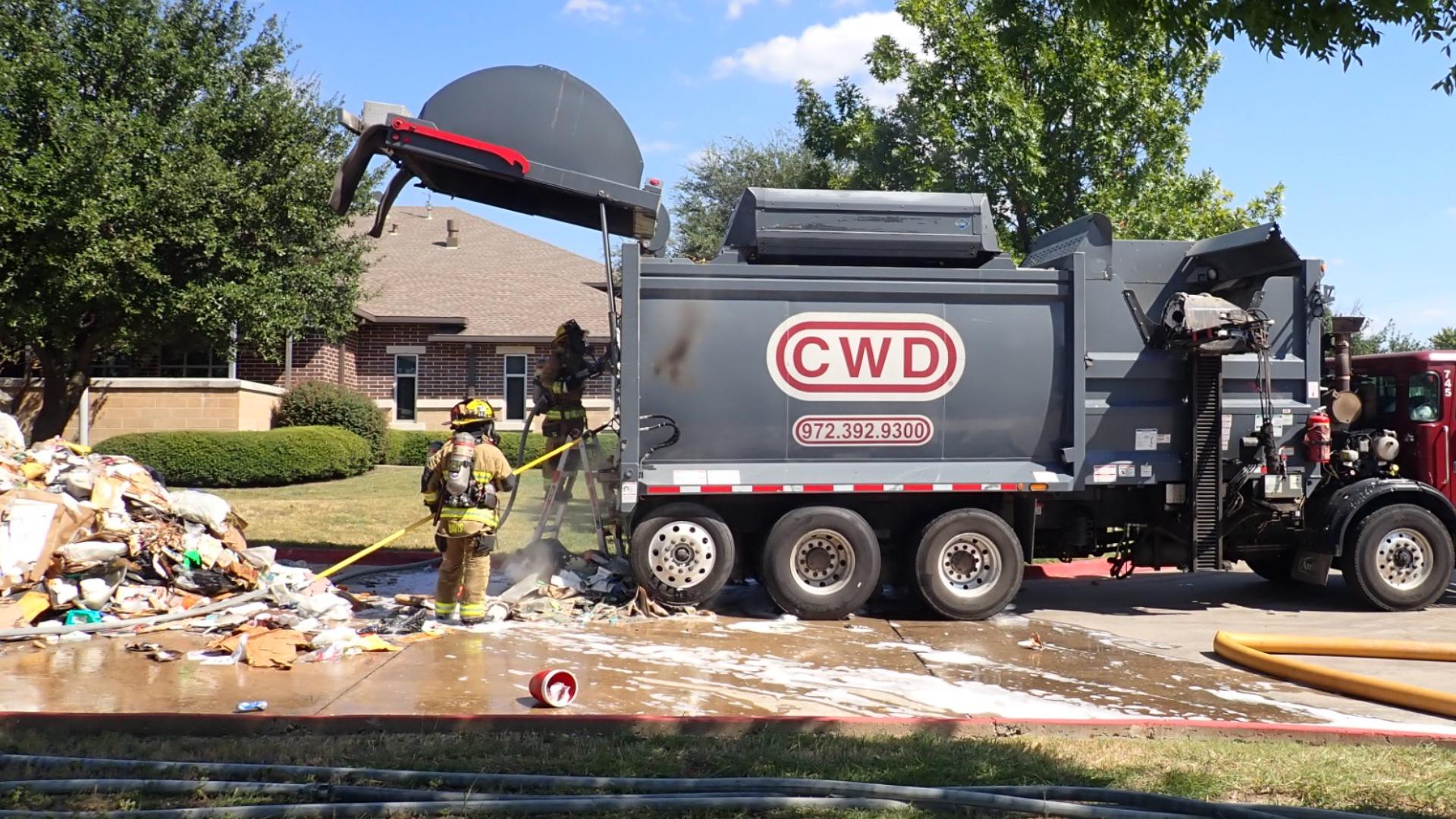 Truck dumps smoldering garbage in front of Texas fire station | wfaa.com