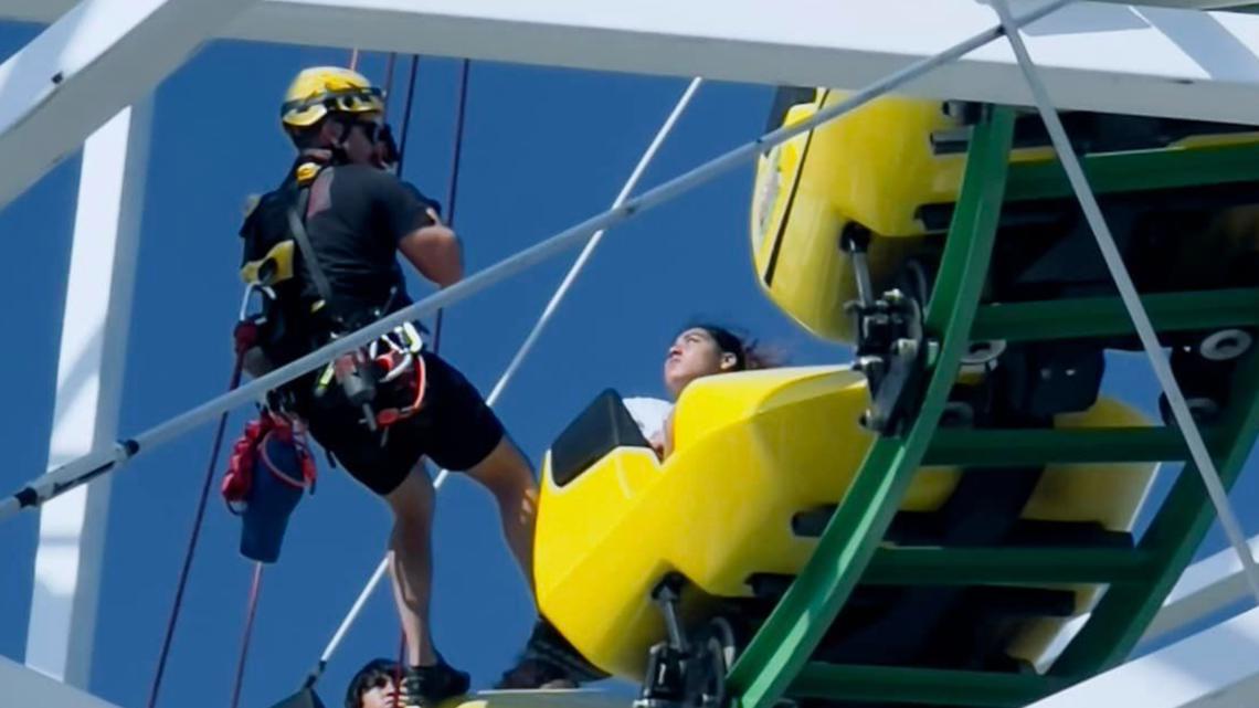 Riders rescued after being stuck on broken down roller coaster | wfaa.com