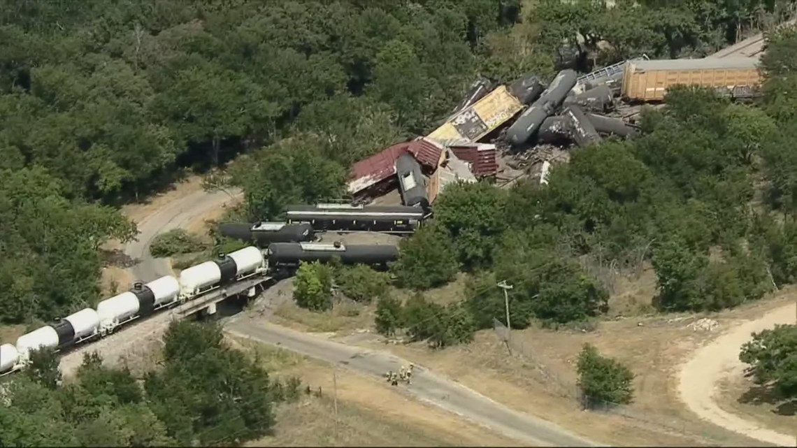 Crews work to clean up a major train derailment involving harmful ...