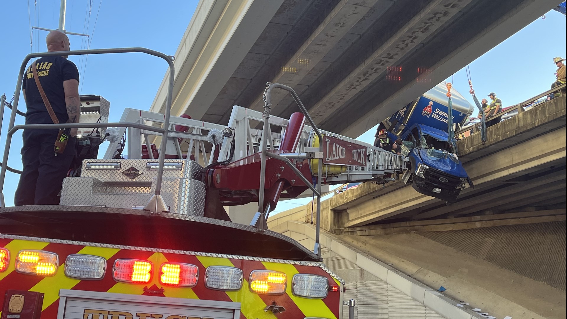 Truck hanging off I-35 bridge | wfaa.com