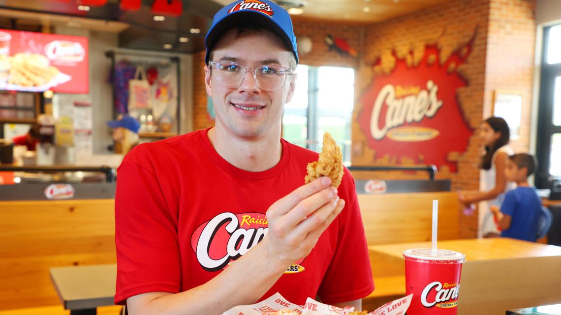 Olympic swimmer Nic Fink works shift at Dallas Raising Cane's | wfaa.com