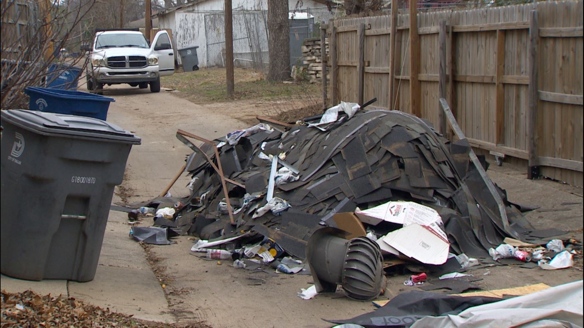 Dallas residents outraged by mysterious roofing debris dump in alley ...