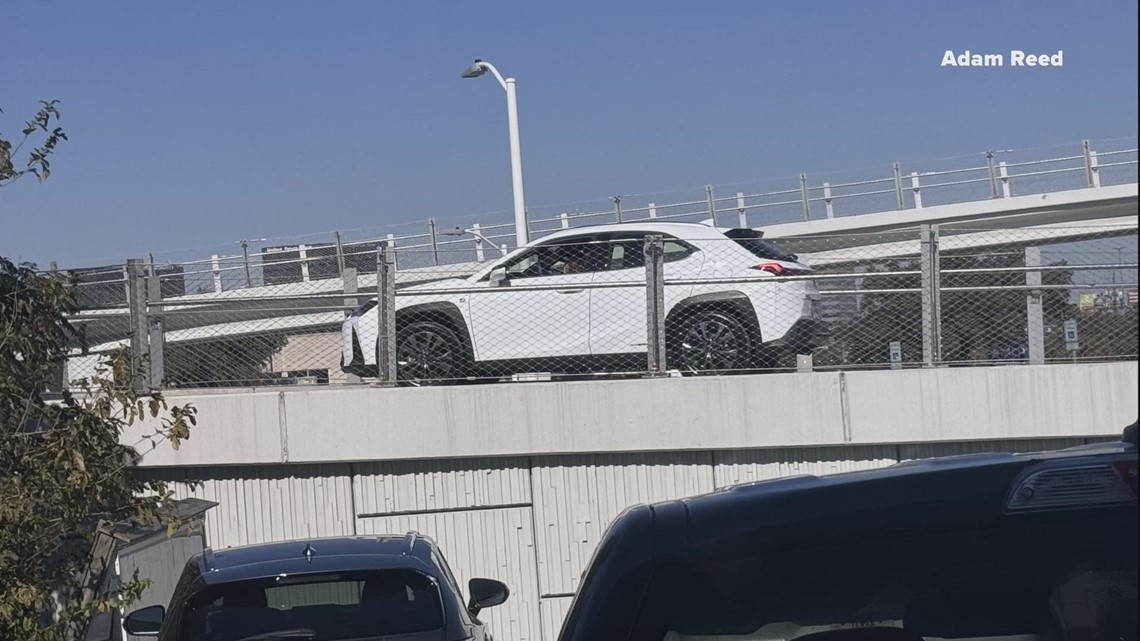 Dallas pedestrian bridge over 75 opens, car ends up on it | wfaa.com