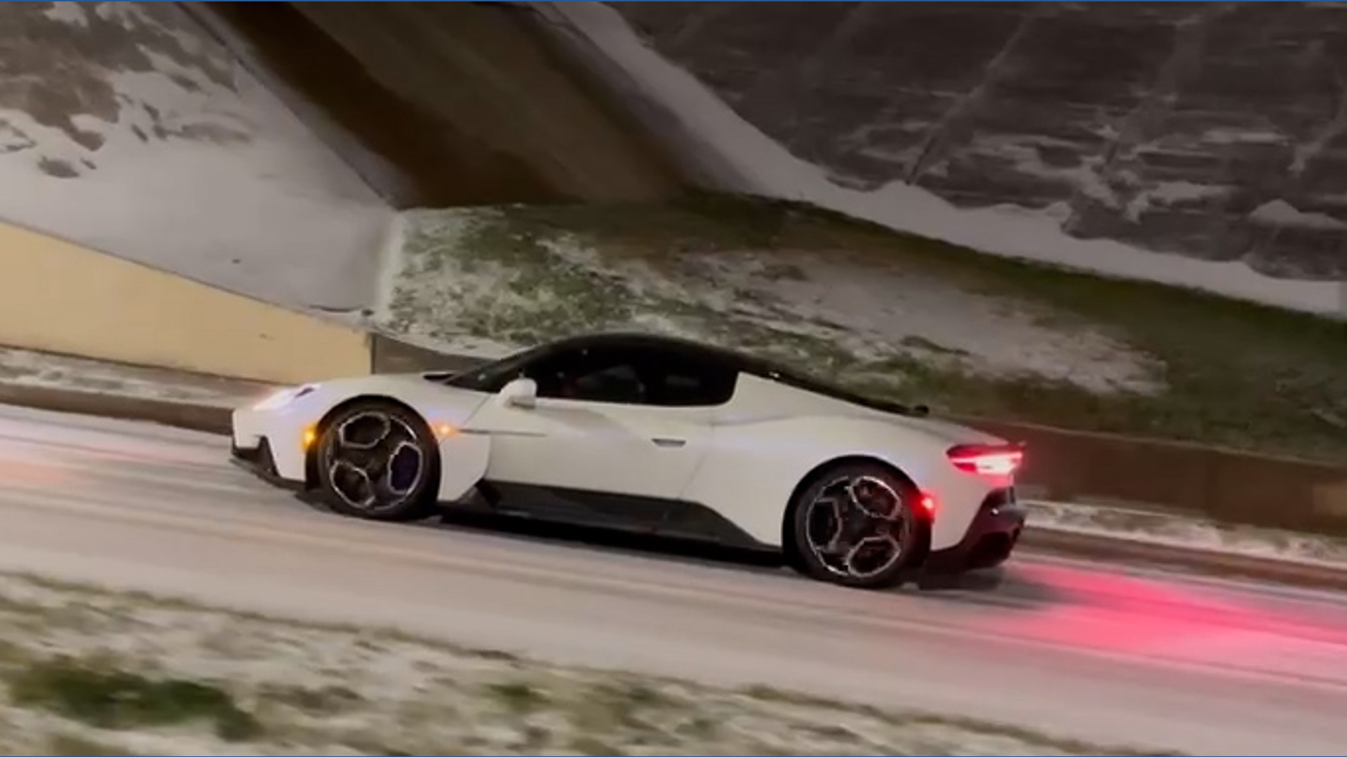 Maserati fails to drive up Harry Hines Boulevard amid icy weather ...