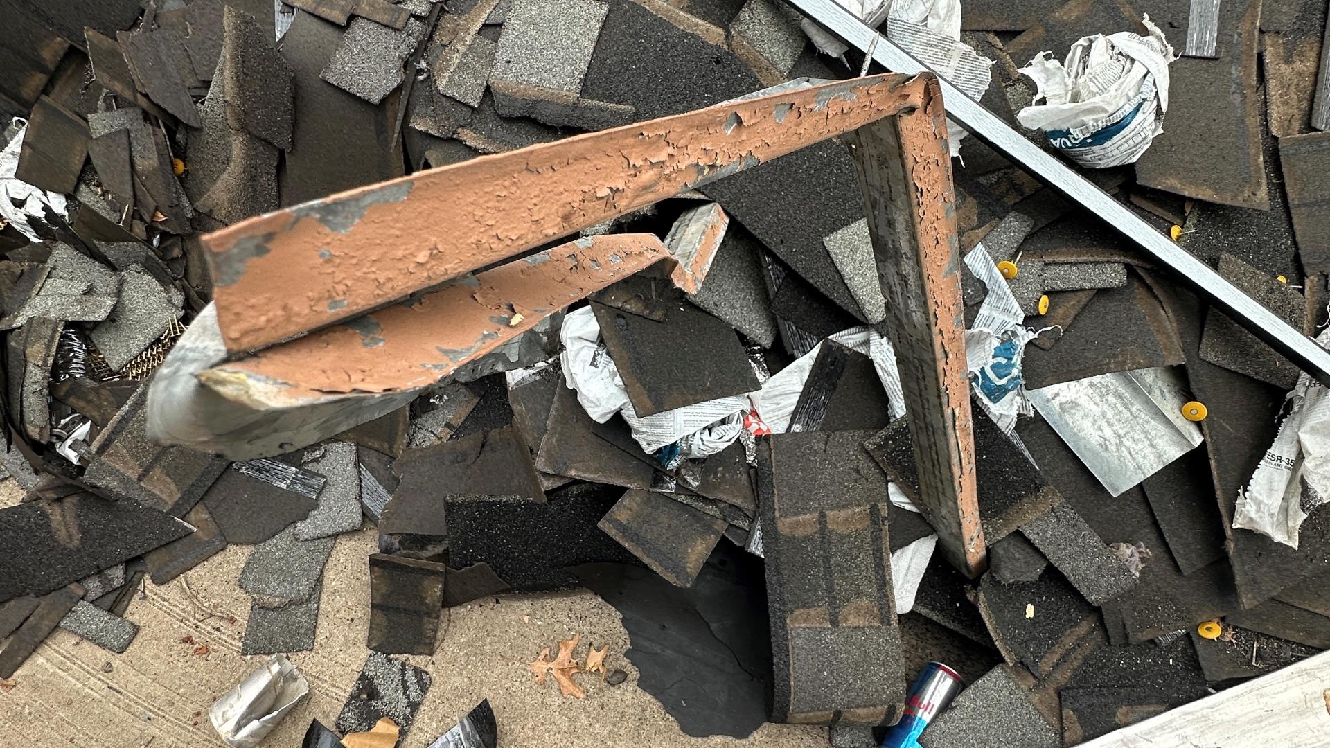 Dallas residents outraged by mysterious roofing debris dump in alley ...