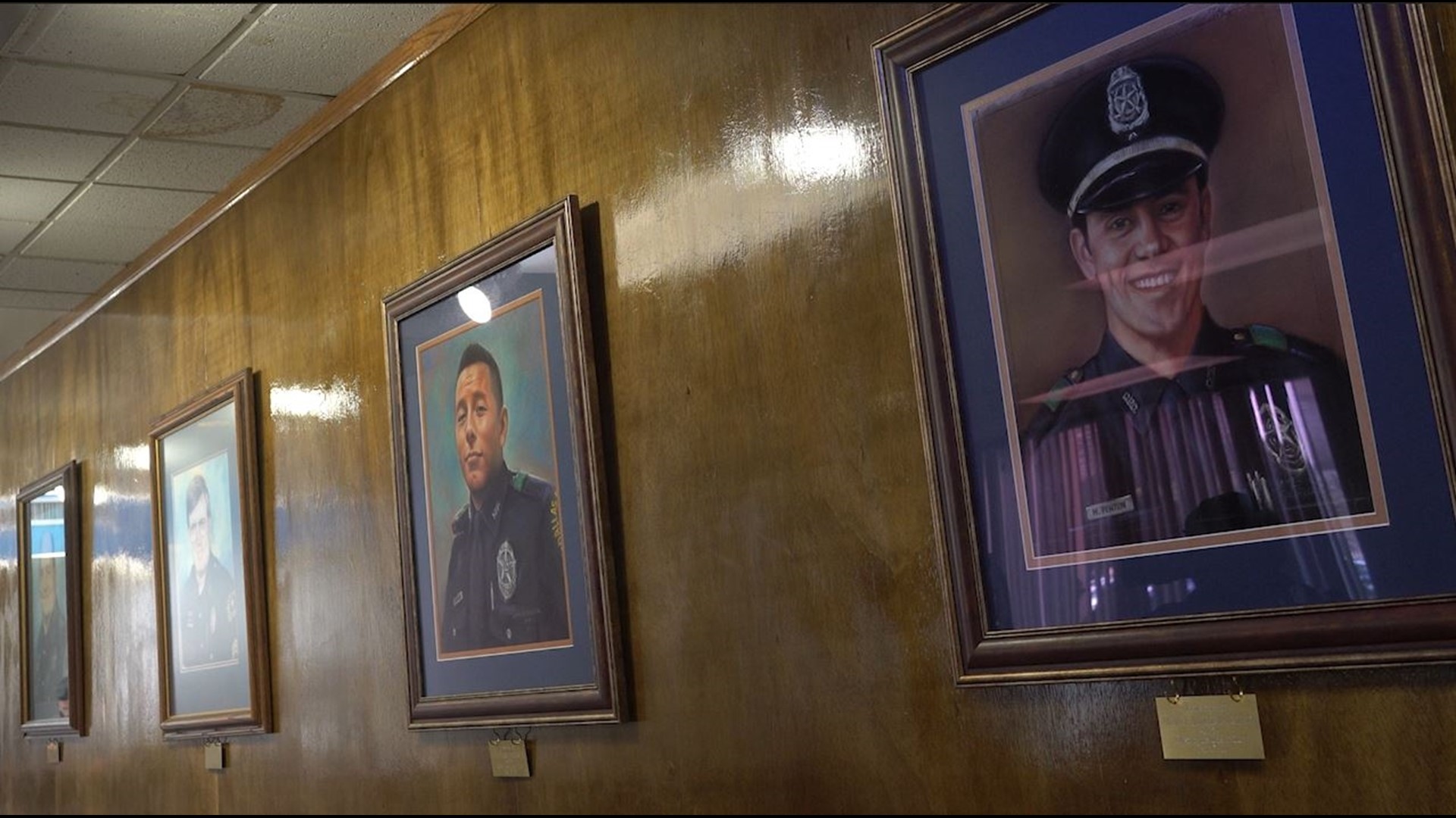 Portrait unveiled of fallen Dallas police officer Mitchell Penton ...