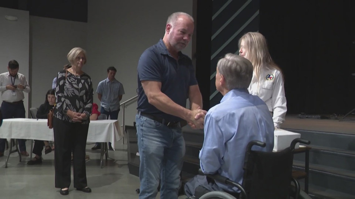 Gov. Abbott presents checks to victims of deadly July flooding in ...