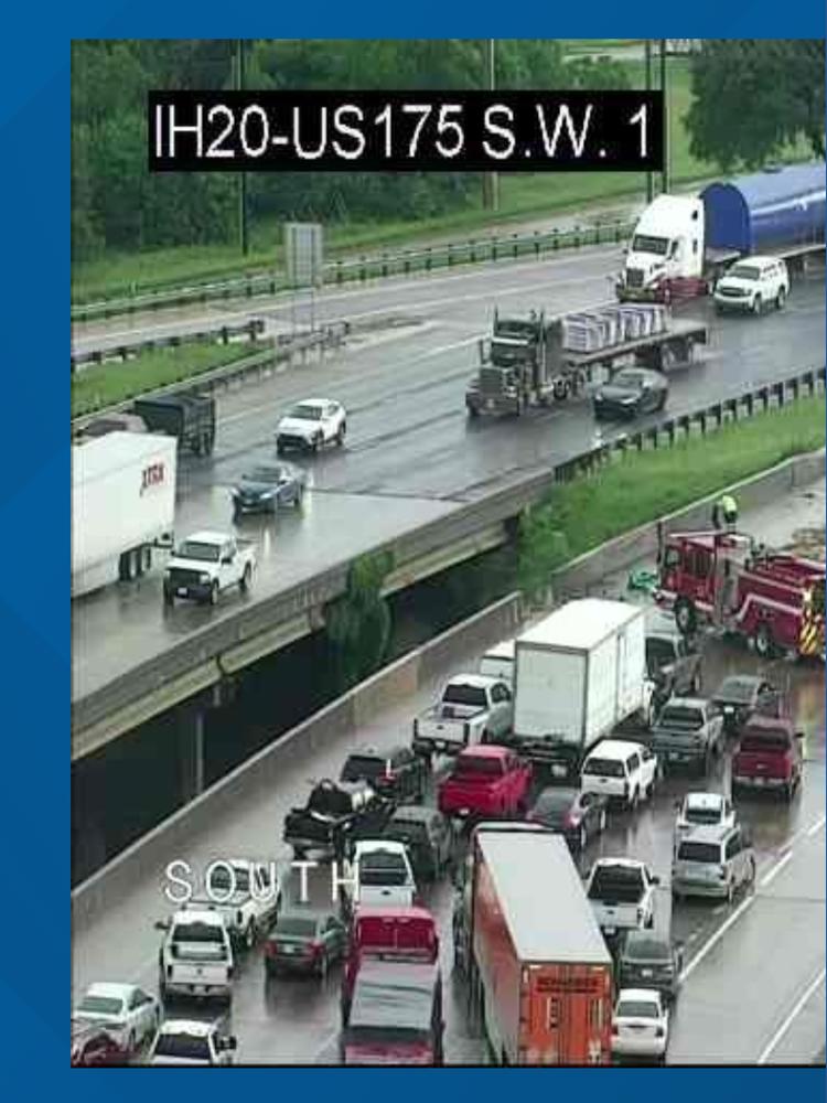 Overturned 18-wheeler spills diesel fuel onto LBJ Freeway in Dallas ...