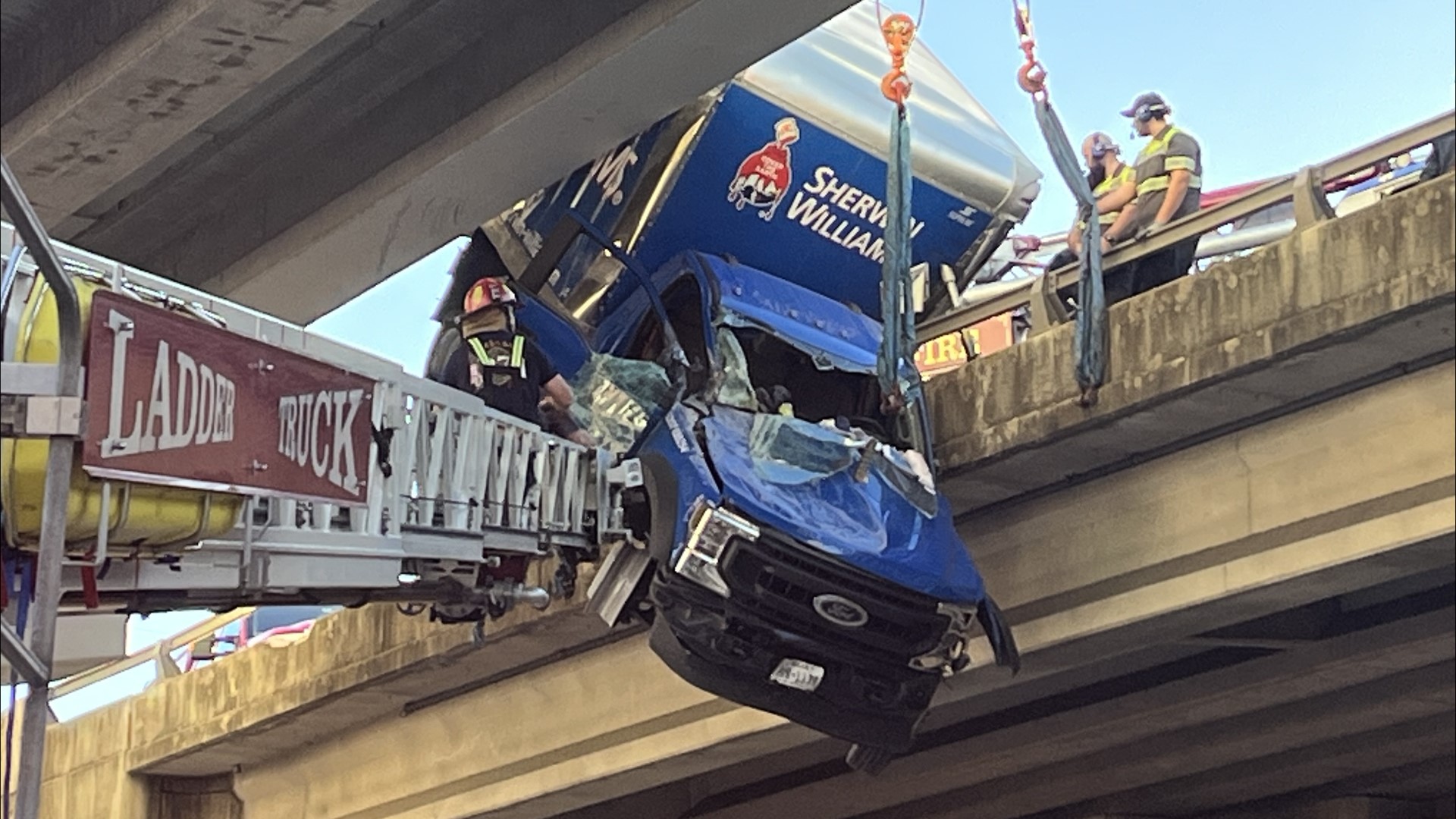 Truck hanging off I-35 bridge | wfaa.com