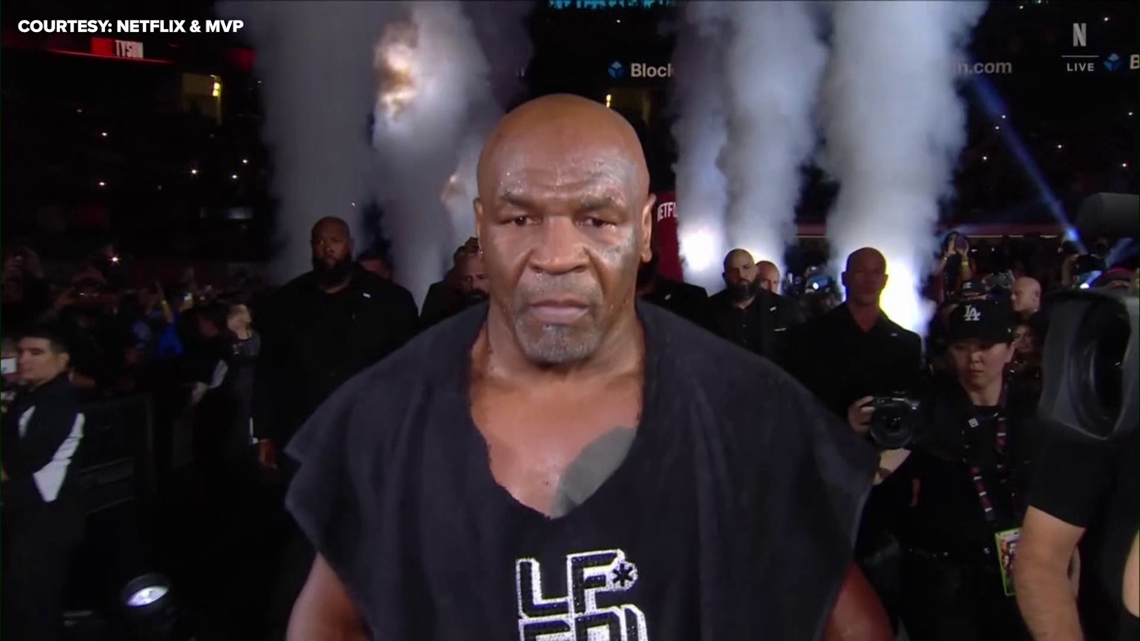 Mike Tyson walks in to fight against Jake Paul at AT&T Stadium | wfaa.com