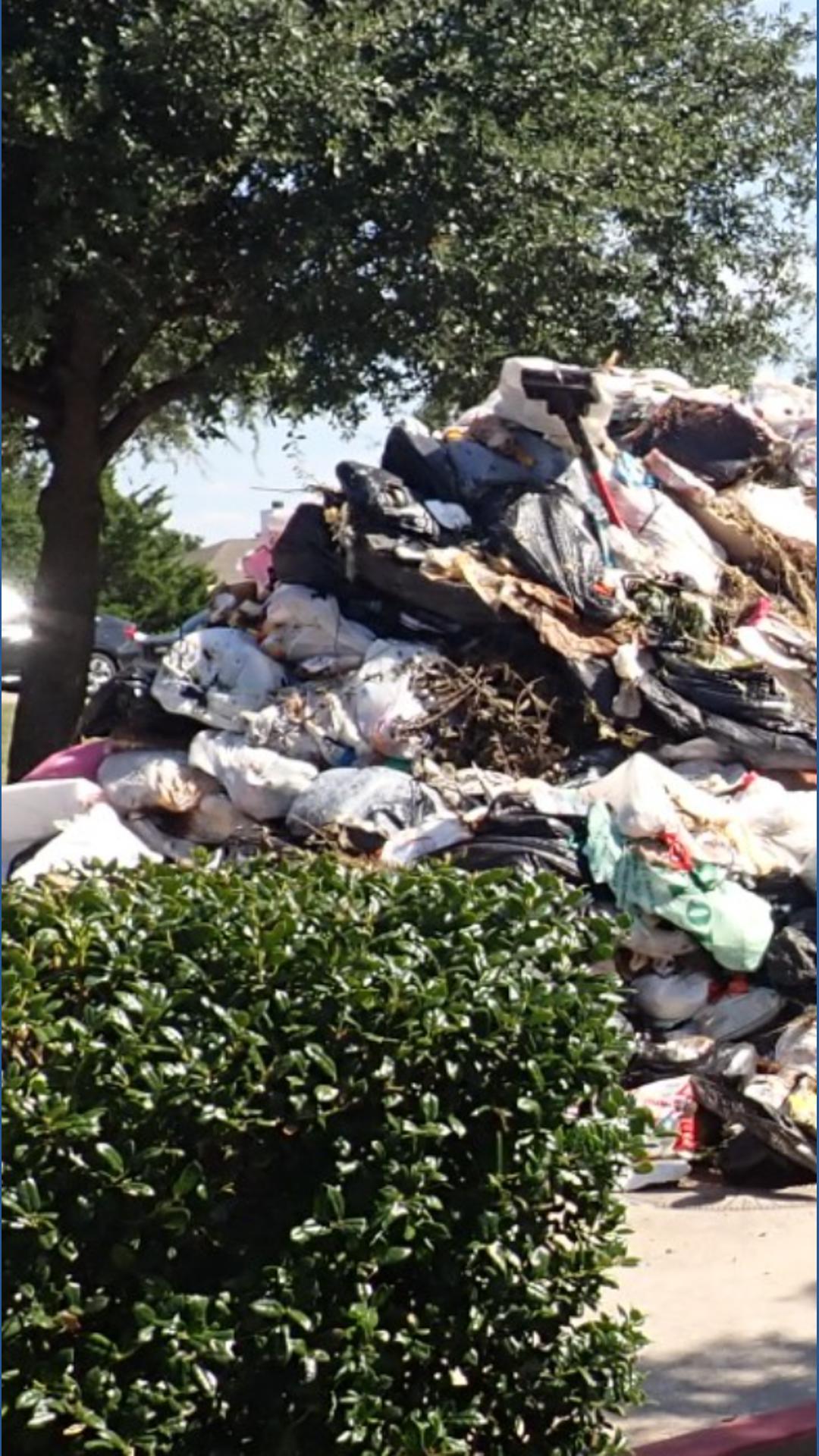 Truck dumps smoldering garbage in front of Texas fire station | wfaa.com