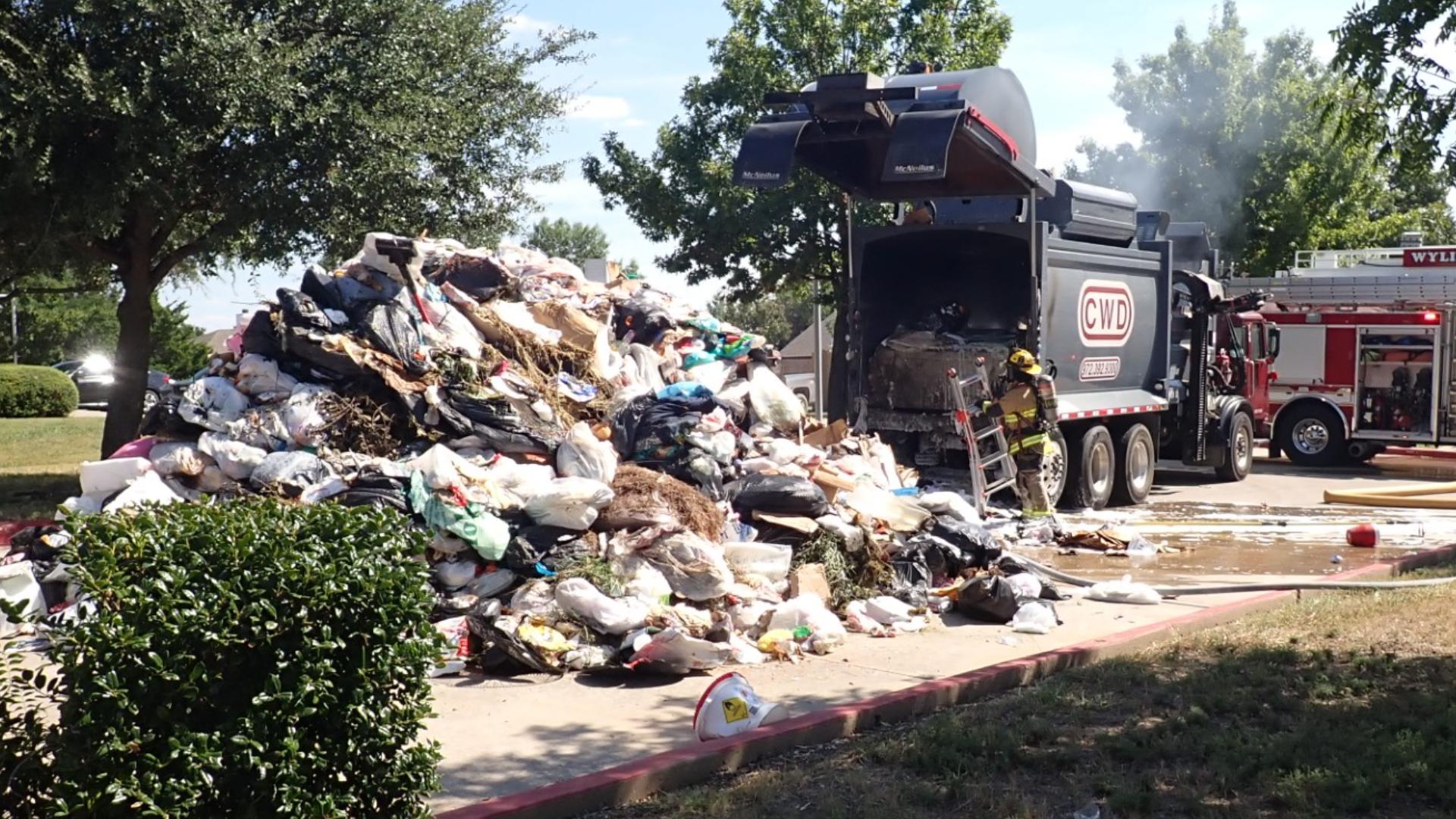 Garbage truck empties smoldering trash at North Texas fire station | wfaa.com