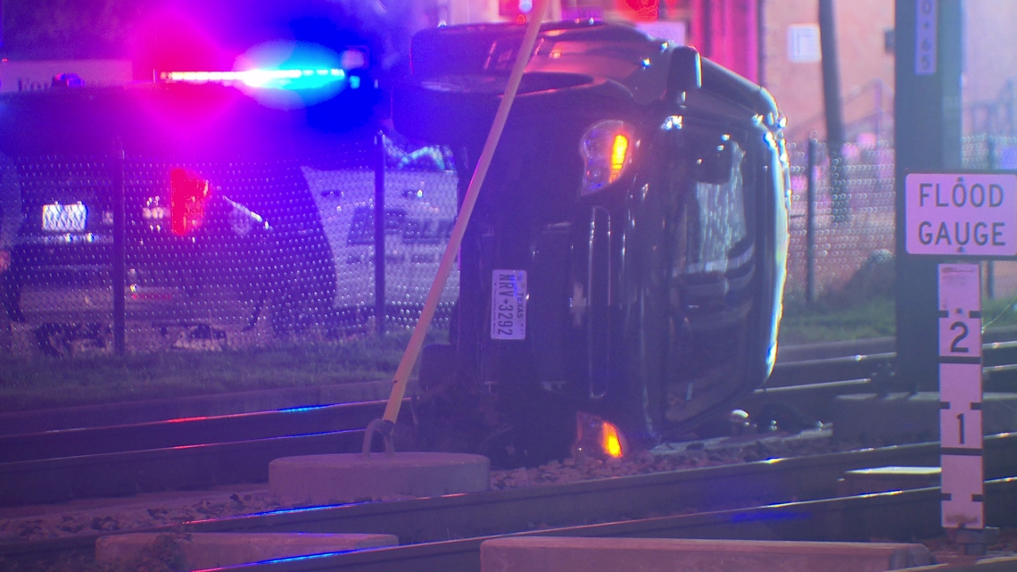 Car overturns on DART tracks in Downtown Dallas, police say | wfaa.com