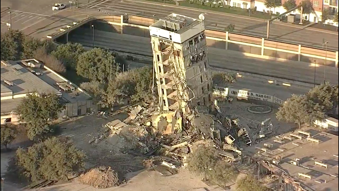 Building left partially standing after implosion in Uptown | wfaa.com