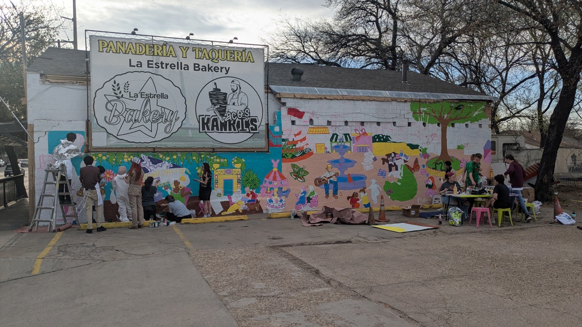 Local group painting mural for historic Dallas bakery | wfaa.com