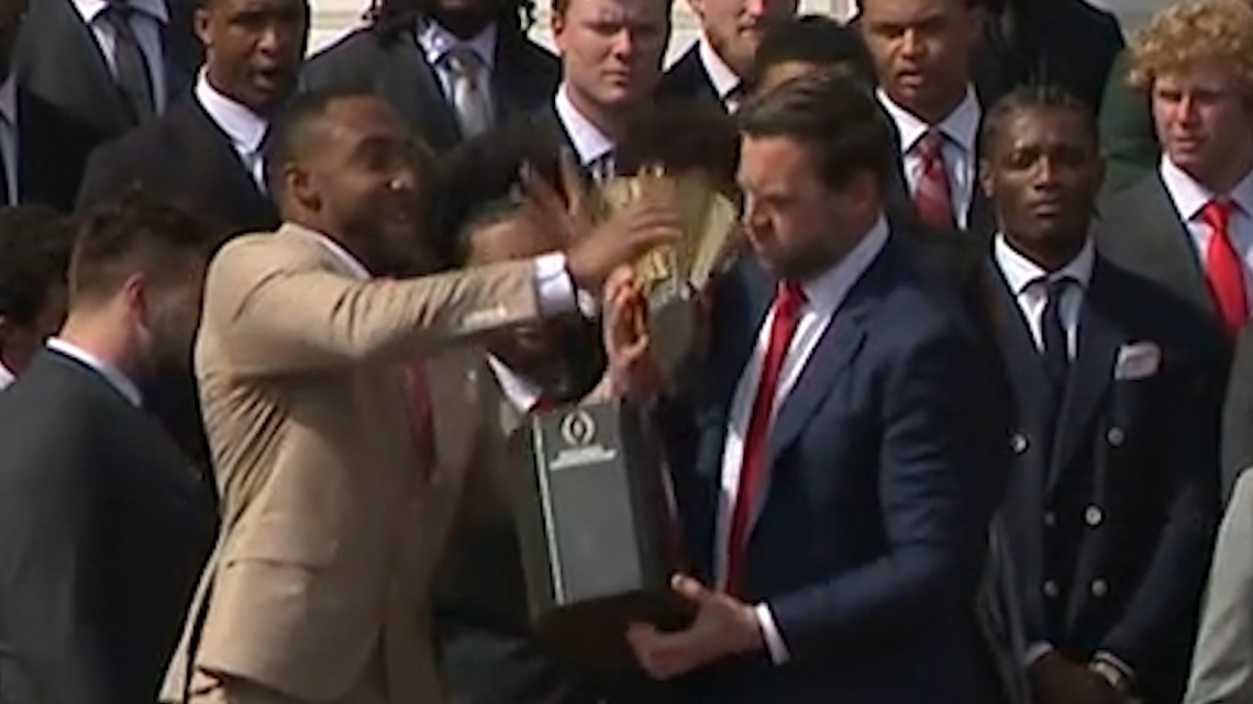 VP JD Vance fumbles the Ohio State National Championship trophy | wfaa.com
