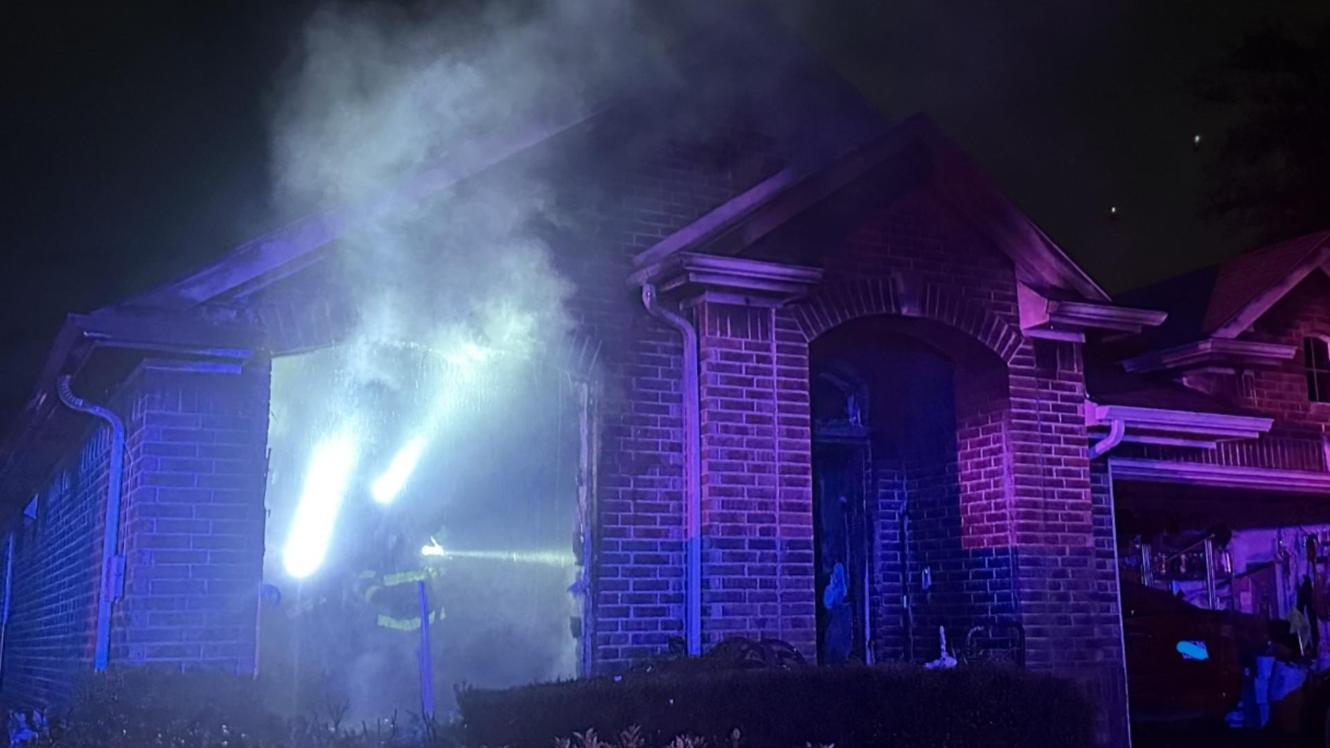 Grand Prairie firefighters rescue 3 people from burning home, officials ...