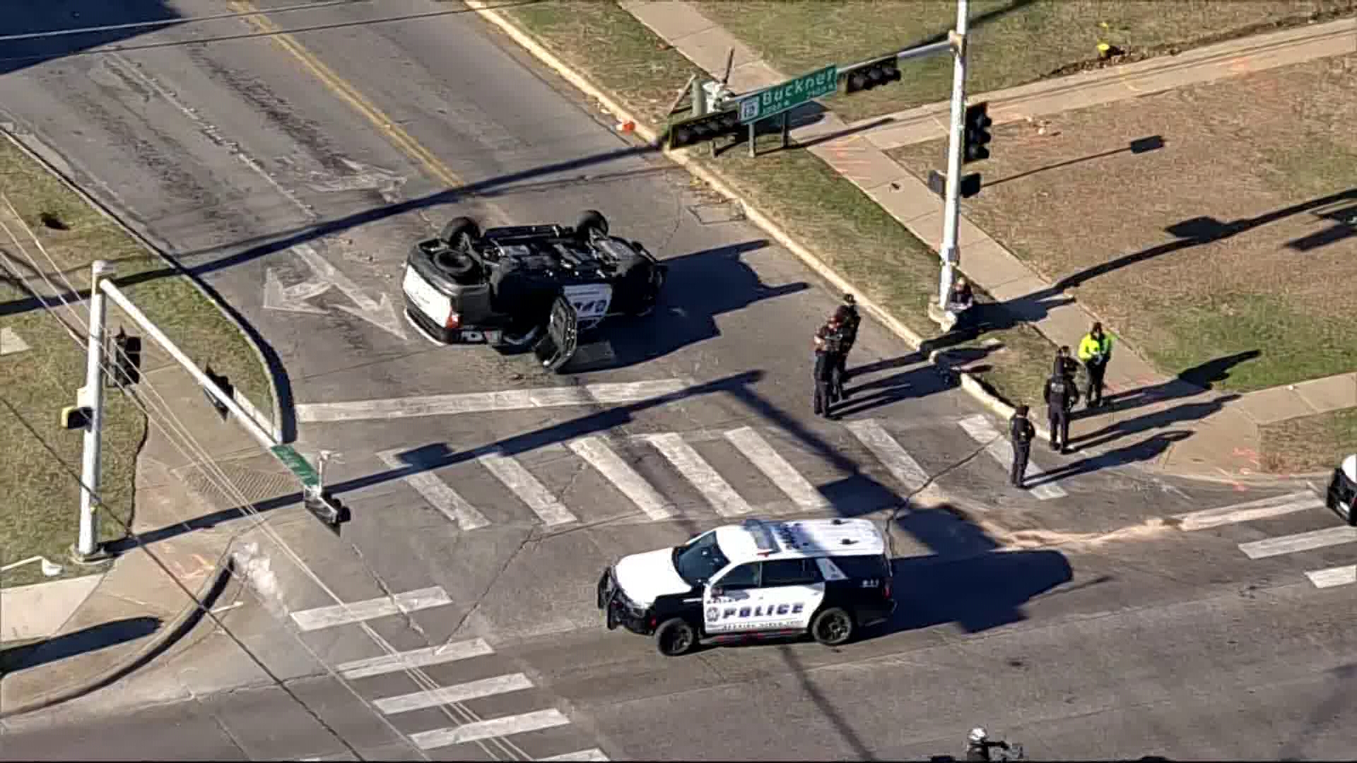 Dallas police vehicle flipped after crash, officer hospitalized ...
