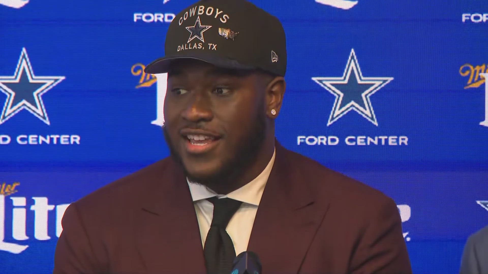 Dallas Cowboys first-round draft pick Tyler Booker speaks for the first ...